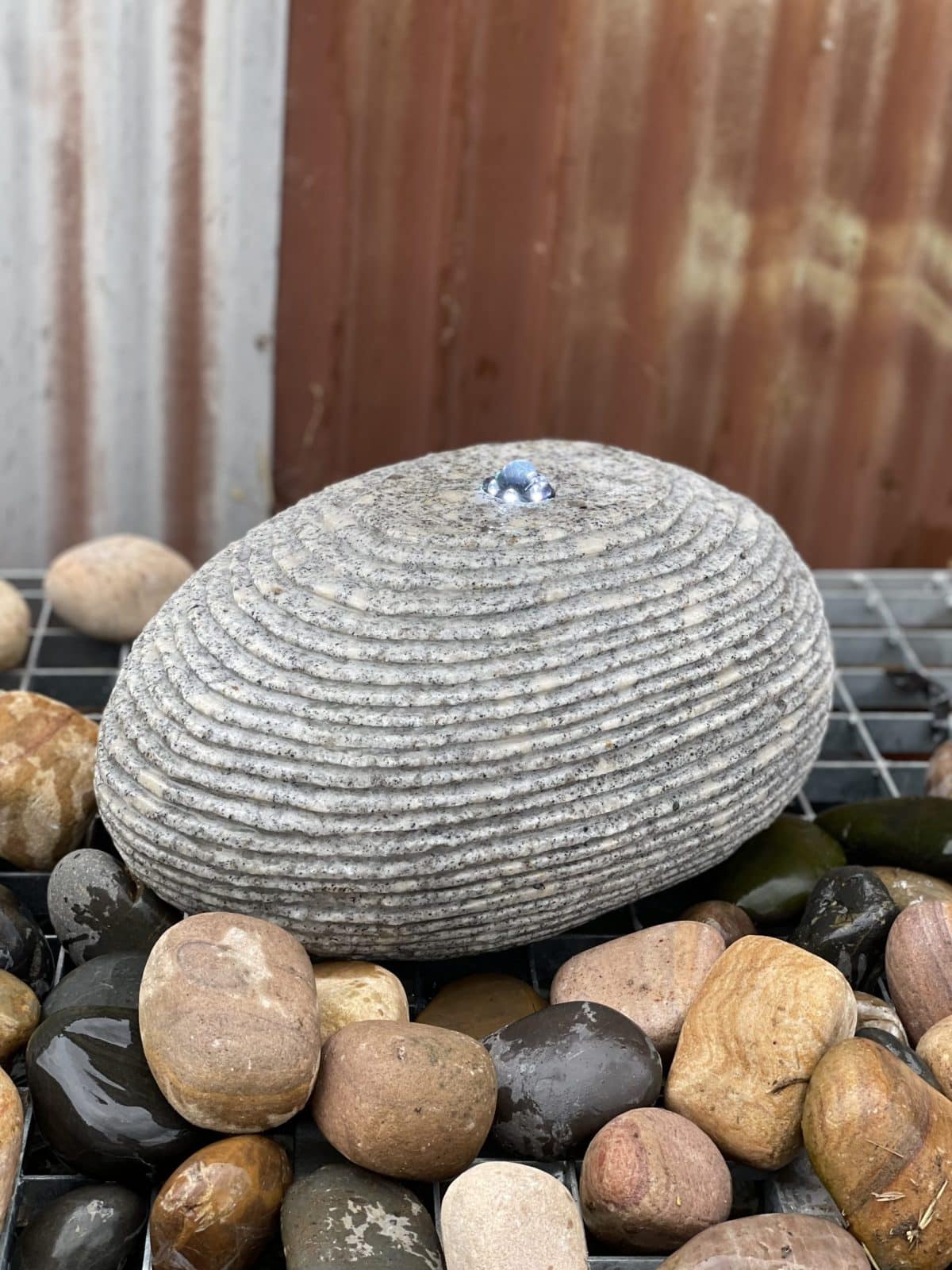 Cascading Pebble Light Grey Granite - Ornamental Classics