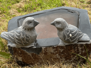 Basalt Birdbath with two birds - Ornamental Classics